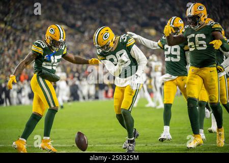 Green Bay Packers safety Zayne Anderson (39) recovers a fumble during ...