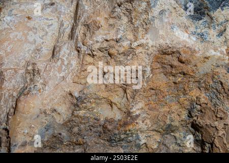 Natural rock formation displays a captivating blend of minerals with ...