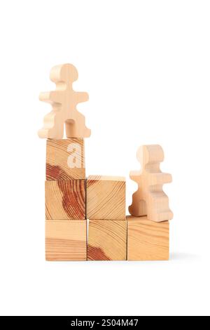 Human figures on wooden blocks, red one on top against white background ...