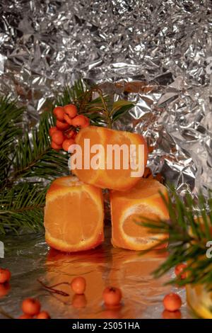 Cubes from iced tangerine on crumpled aluminium foil close-up Stock ...