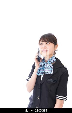 Cabin attendant making a phone call Stock Photo - Alamy