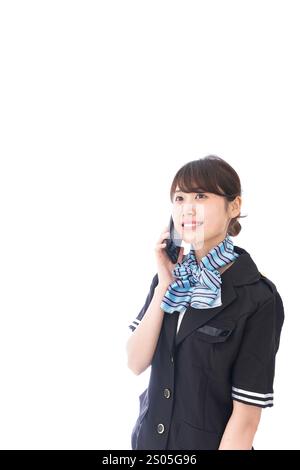 Cabin attendant making a phone call Stock Photo - Alamy