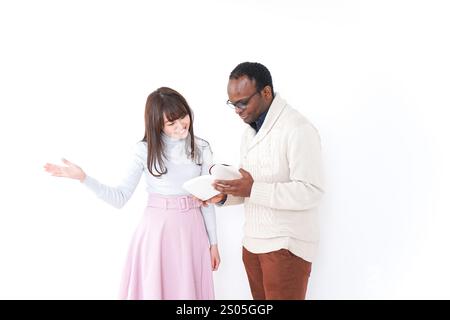 Woman giving directions on the road Stock Photo - Alamy