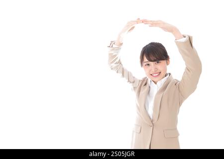 Businesswoman making maru sign Stock Photo - Alamy