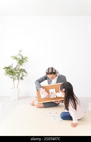 Children taking English conversation lessons Stock Photo - Alamy