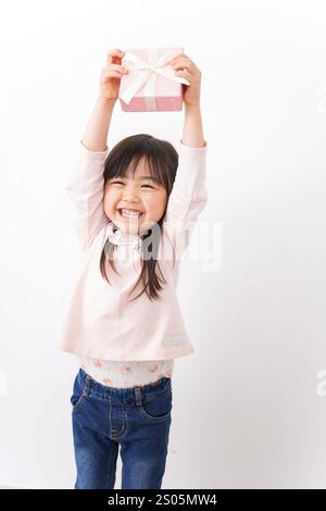 Children giving presents Stock Photo - Alamy