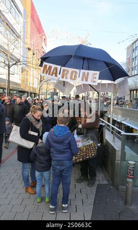a roasted chestnut sign in german Maroni in front of a sales stand ...