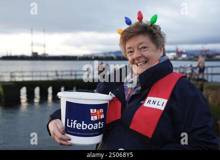 Helen Doogue, a volunteer with the RNLI, collects donations during the ...