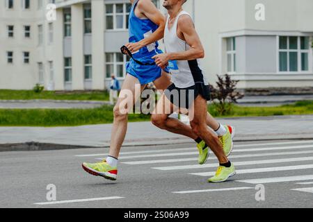 blind runner with his guide running marathon isolated on white ...