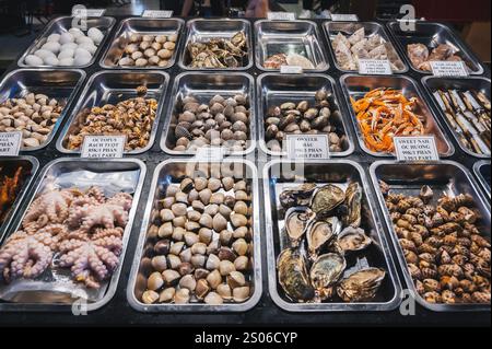 Seafood, including shrimp, octopuses, clams, sea snails, squid, octopus ...