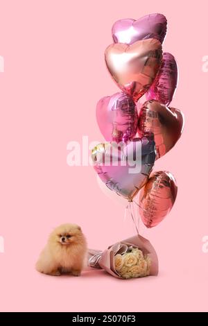 White dog with roses and balloons on pink background with space for ...