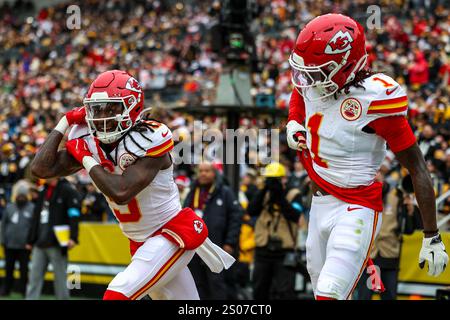 Kansas City Chiefs wide receivers coach Connor Embree, left, talks with ...