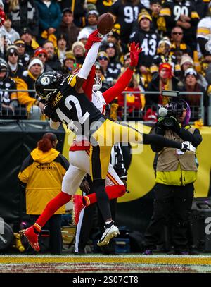 Pittsburgh Steelers cornerback James Pierre (42) front flips into the ...