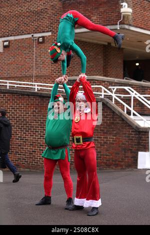 Performers dressed as Santa and his elves on King George VI Chase Day ...