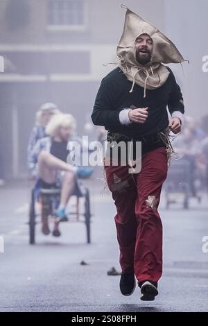 Boxing Day Pram Race in Crewkerne. Hundreds of locals line the streets ...