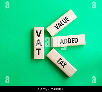 VAT - Value Added Tax symbol. Wooden cubes with word VAT. Beautiful ...