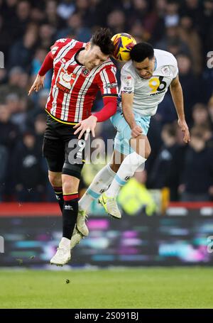Kieffer Moore of Sheffield United battle for the ball with David ...