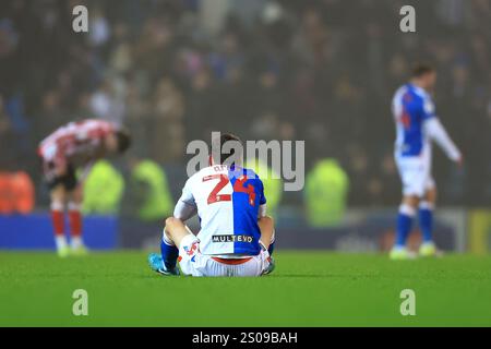 Blackburn Rovers' Owen Beck (obscured) reacts following the Sky Bet ...