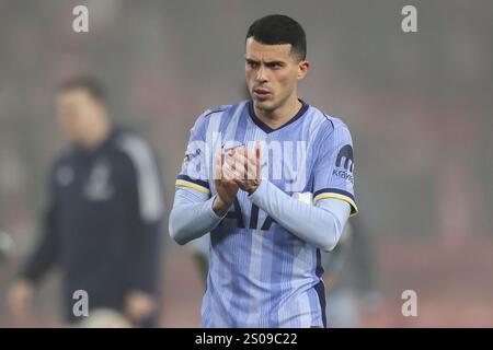 Pedro Porro of Tottenham Hotspur applauds away support at full time ...