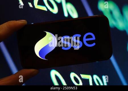 In this photo illustration, the logo of SSE is displayed on the screen ...