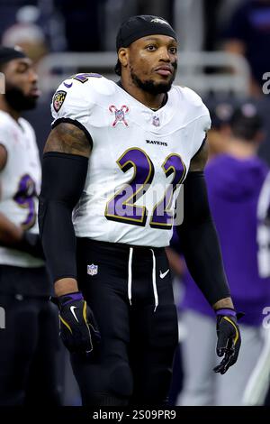 Baltimore Ravens running back Derrick Henry (22) carries the ball ...