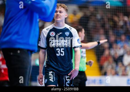 Jarnes Faust (TBV Lemgo Lippe, #35) celebrates TBV Lemgo Lippe vs. SC ...