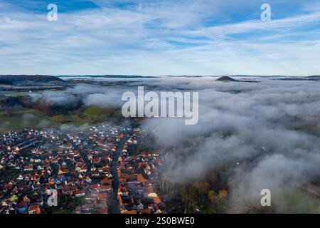 Eichsfeld, Germany. 27th Dec, 2024. The dense fog in the morning covers ...