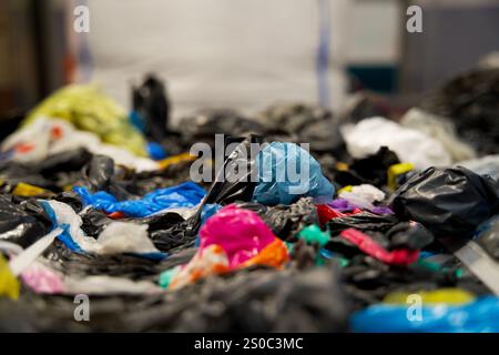 Stack of plastic residual mix waste in a plastic recycling factory ...