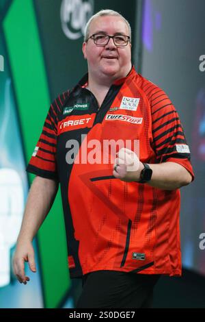 Madars Razma celebrating during the second round match between Darren ...