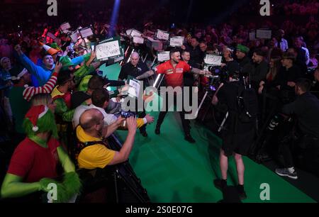 Gerwyn Price walks out ahead of his semi-final against Luke Littler on ...