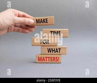 Important thing symbol. Wooden blocks with words Make time for what ...