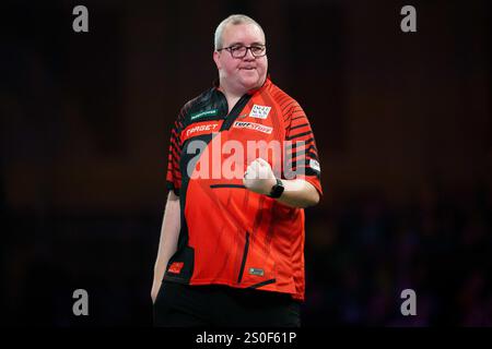 Madars Razma celebrating during the second round match between Darren ...