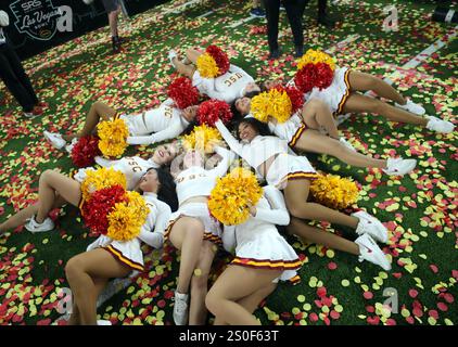 December 27, 2024 - USC Cheerleaders celebrate in the confetti after a ...
