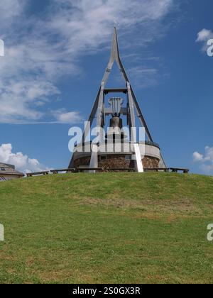 Concordia 2000: Bell Tower, Symbol of Peace, Amidst the Alpine Peaks ...