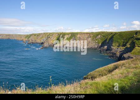 Beautiful view of cliffs on the seacoast under a cloudy sky Stock Photo ...