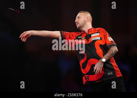 Nathan Aspinall in action during his match against Michael Smith at the ...