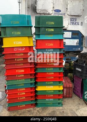 Empty yellow plastic crates Stock Photo - Alamy