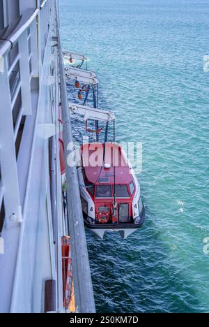 Deploying one of the Azamara Quest lifeboats using hoists off Mossel ...