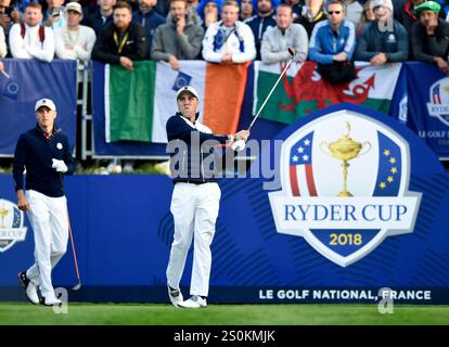 Justin Thomas of the USA plays from the bunker on the fifth hole on day ...