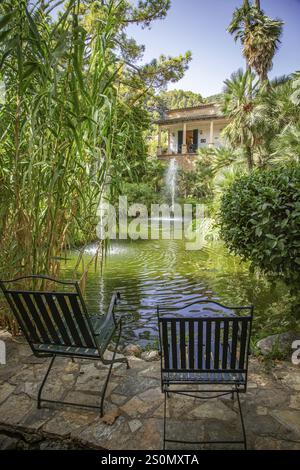 Waterfalls and small lakes surrounded by lush greenery and turquoise ...
