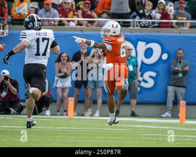 Miami running back Damien Martinez runs in the 40-yard dash at the NFL ...