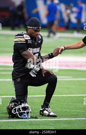 December 28, 2024: Travis Hunter (12) of the University of Colorado pre ...