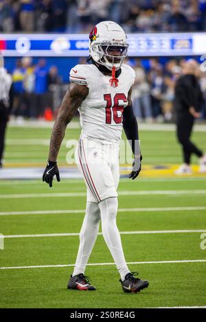 Arizona Cardinals cornerback Max Melton (16) is helped off the field ...