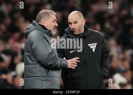 Fourth official Tim Robinson speaks to Pep Guardiola manager of ...