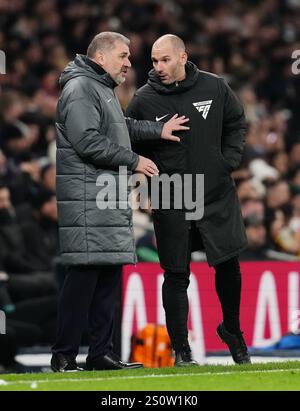 Fourth official Tim Robinson speaks to Pep Guardiola manager of ...