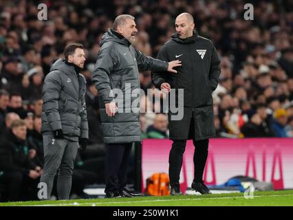 Fourth official Tim Robinson speaks to Pep Guardiola manager of ...