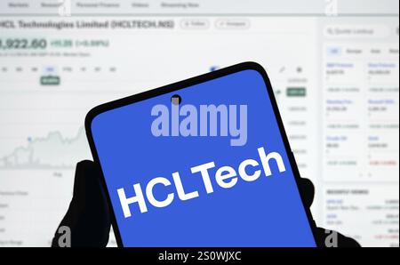 HCL logo is displayed on smartphone. HCL Technologies Limited is an ...