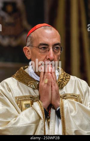 Cardinal Baldassare Reina celebrates a mass on the third of nine days ...