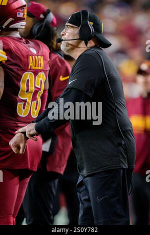 Washington Commanders head coach Dan Quinn speaks during a press ...