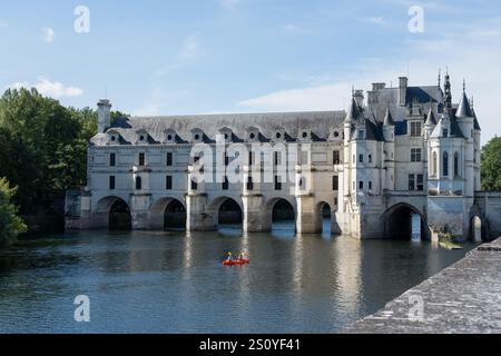 a magnificent white French chateau built on the river Cher, near ...